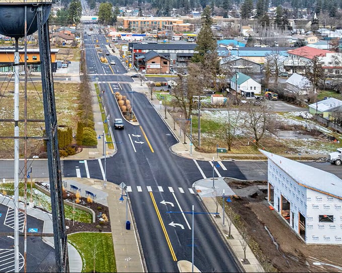 Main Street simplicity with mountain majesty in the background&mdash;Post Falls masters the art of unpretentious beauty.