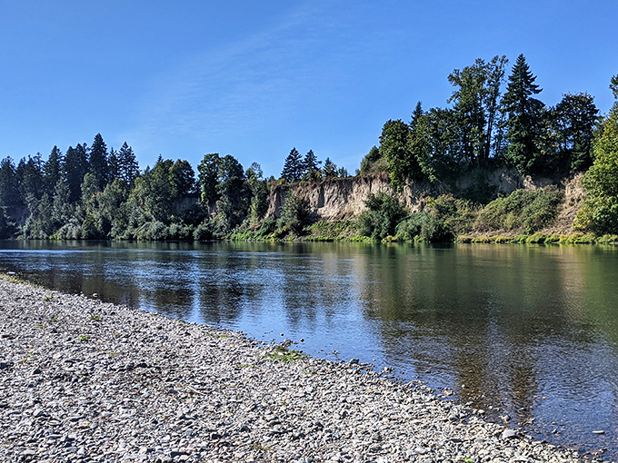 Where river meets rocky shore, creating that perfect meditative spot to skip stones or contemplate life's big questions&mdash;like why you waited so long to visit.