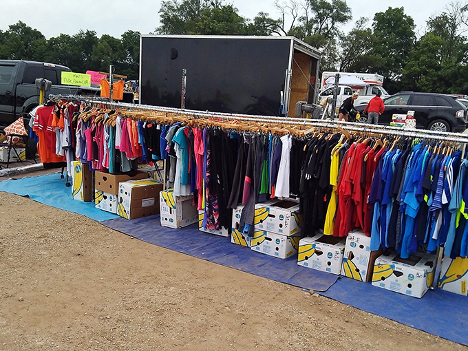 A rainbow of possibilities hangs in the morning light. These racks of clothing aren't just bargains&mdash;they're future fashion statements waiting to happen.