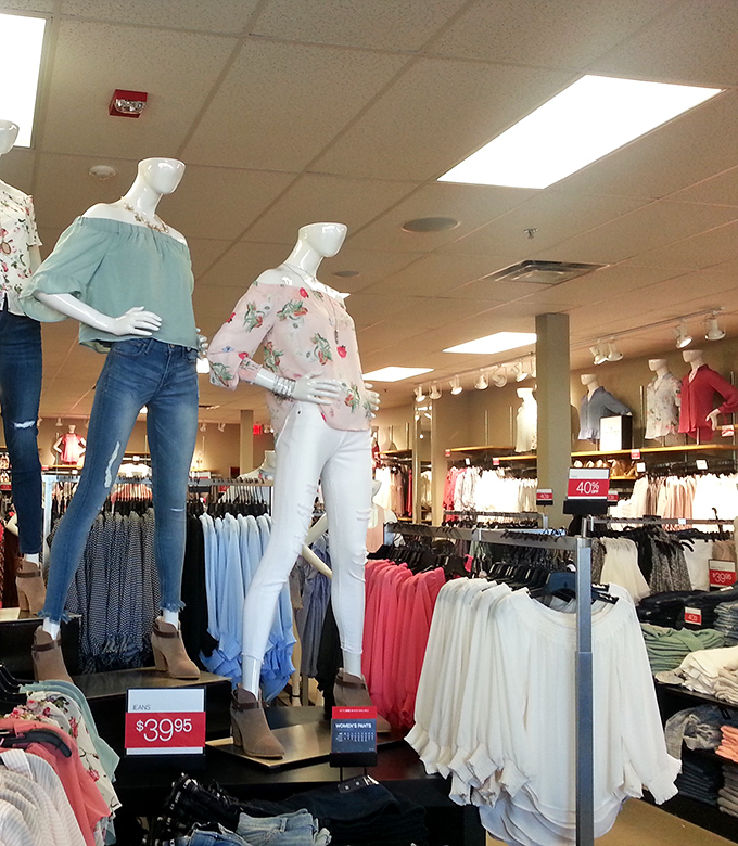 Mannequins modeling the season's must-haves at prices that won't require a second mortgage. Fashion math at its finest!