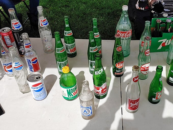 A lineup of vintage soda bottles that tells more American history than most textbooks. Mountain Dew never looked so collectible!