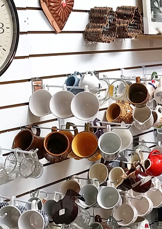 A symphony of mugs in every shape and color imaginable&mdash;someone's morning coffee vessel is waiting to be discovered among this ceramic collection.