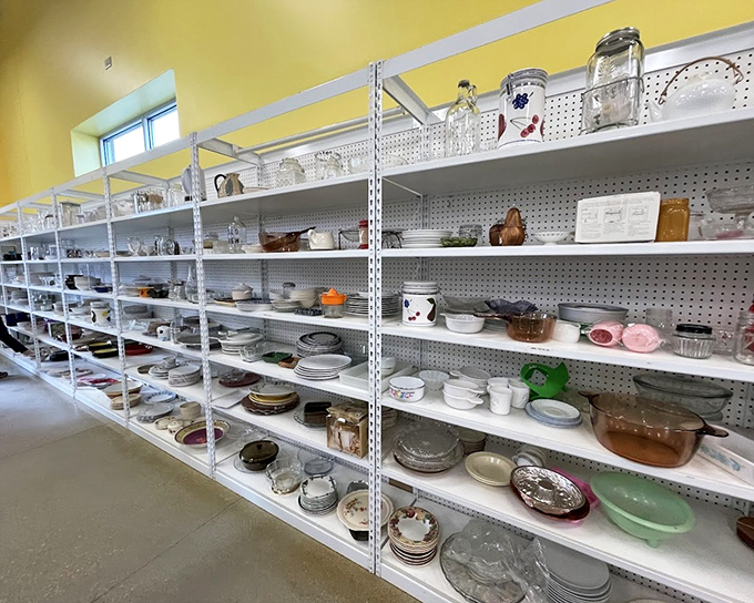 Pyrex paradise! Each plate tells a story of family dinners past. That avocado green casserole dish? Pure 1970s nostalgia on a shelf.