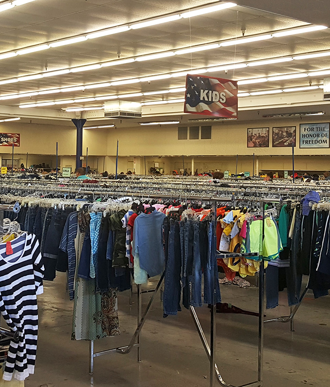 Inside awaits a sea of clothing racks that would make Marie Kondo simultaneously thrilled and terrified. Joy sparks in every aisle!
