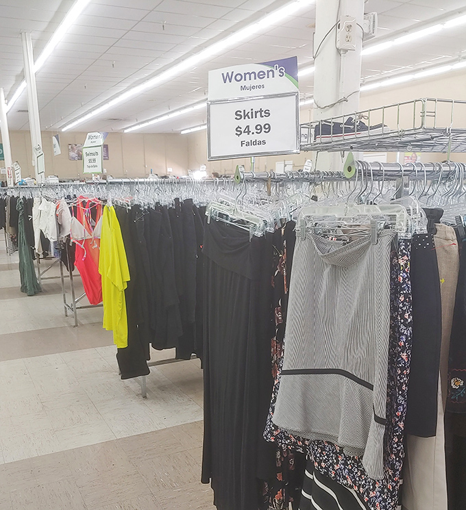 The women's section beckons with color-coded racks and organization that would make Marie Kondo proud. That $4.99 skirt might be your next favorite wardrobe staple.