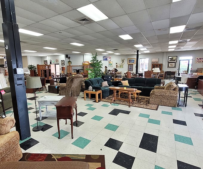 A furniture wonderland where mid-century meets yesterday's living room. That checkerboard floor adds a touch of retro diner charm.