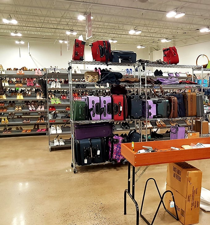 A luggage lover's dream! Rows of suitcases waiting for their next adventure, priced less than a fancy airport sandwich.