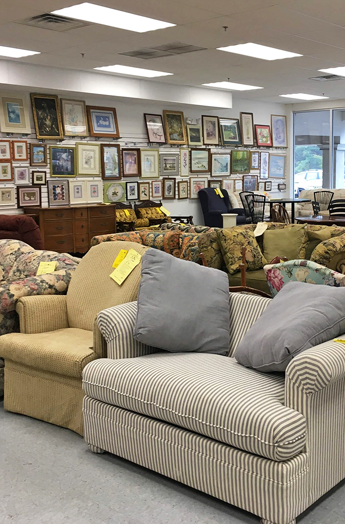 The furniture section resembles a living room museum spanning decades, where every couch has stories to tell and prices that make you double-take.