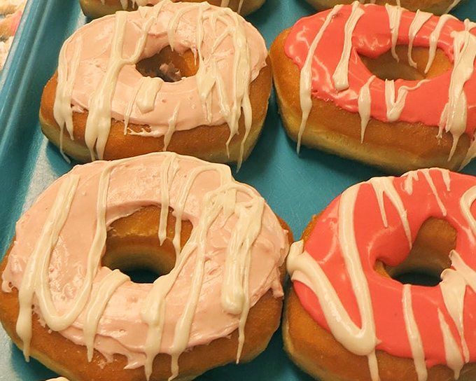 These pink and coral donuts aren't just breakfast&mdash;they're edible art. The drizzle pattern alone deserves its own exhibition at the Guggenheim.