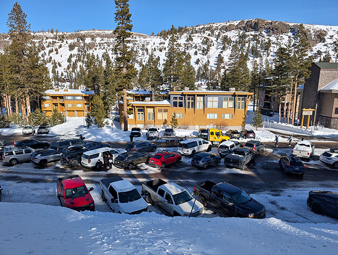 Alpine village living at its finest. Cars nestled in snow like metallic marshmallows waiting for their owners to return from powder adventures.