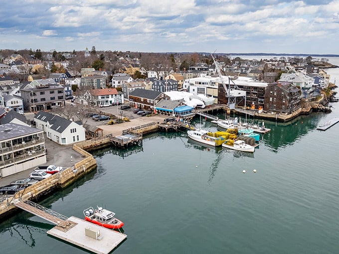This aerial view of Marblehead Harbor reveals a maritime playground where boats outnumber people and everyone seems to have gotten the memo about living well.