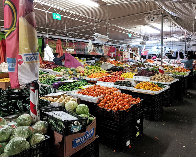Nature's color palette on full display. These produce stands offer fresher fruits and vegetables than most grocery stores, arranged in a rainbow of nutritional possibilities.