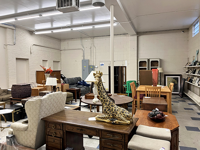 The furniture section showcases everything from practical desks to whimsical decorative giraffes. That wooden desk has stories to tell!