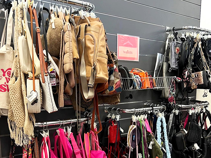 Handbag heaven! From casual totes to evening clutches, this wall of accessories proves one person's "last season" is another's "just discovered" fashion find.