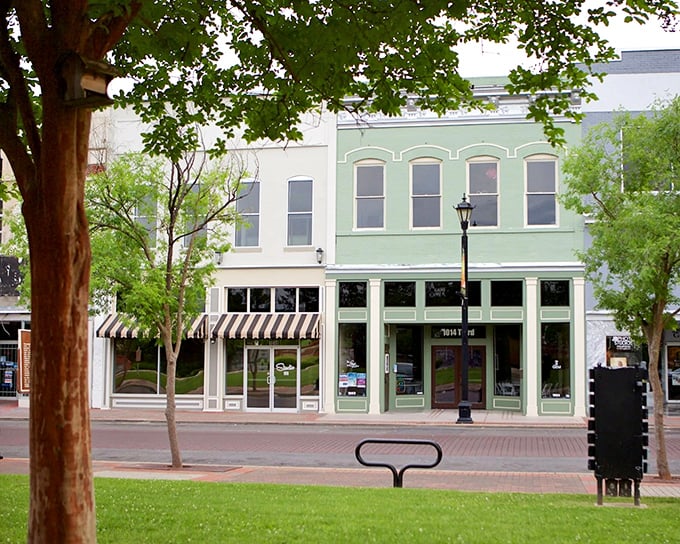 Historic storefronts in soft pastels create a downtown that feels like stepping into a watercolor painting&mdash;one where you can actually afford the real estate.