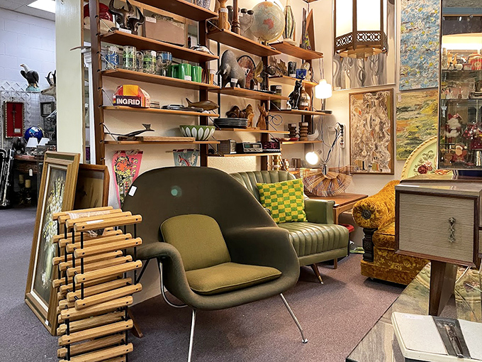 Mid-century modern meets contemporary cool in this furniture vignette. That avocado chair isn't just sitting there&mdash;it's waiting to tell stories.