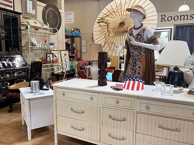 This isn't just furniture&mdash;it's a time capsule with drawers. The parasol adds that "I'm ready for my closeup in a Tennessee Williams adaptation" flair.