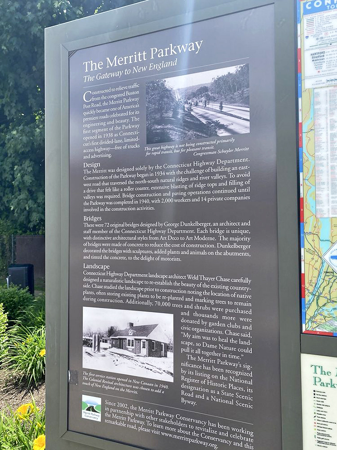 History etched in metal: This informational marker reveals the parkway's storied past while modern travelers zoom by.