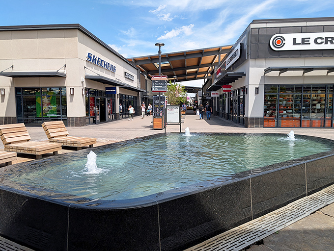 Water features and thoughtful seating create retail therapy's perfect backdrop. The fountains whisper, "Just one more store won't hurt."