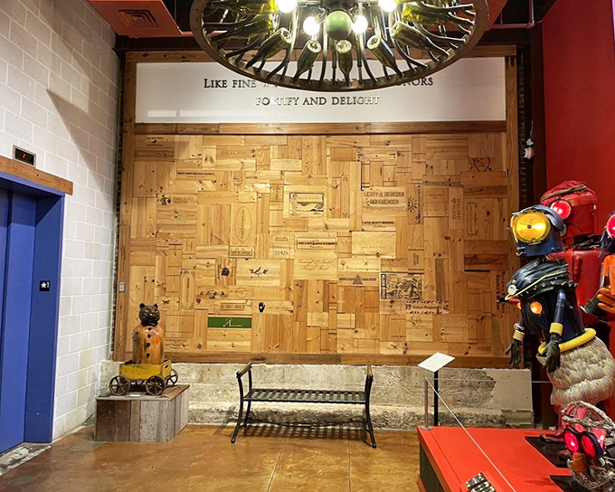 Even the walls tell stories here. This wooden panel installation and robot sentinel stand guard like gatekeepers to another dimension.