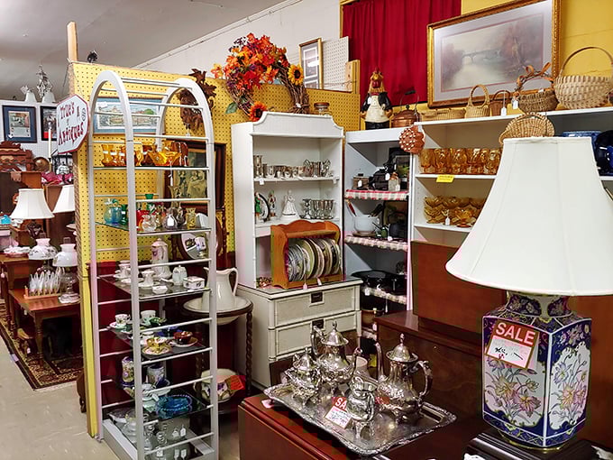 Vendor booths create neighborhoods of nostalgia, each with its own personality. This corner alone could swallow hours of your day.