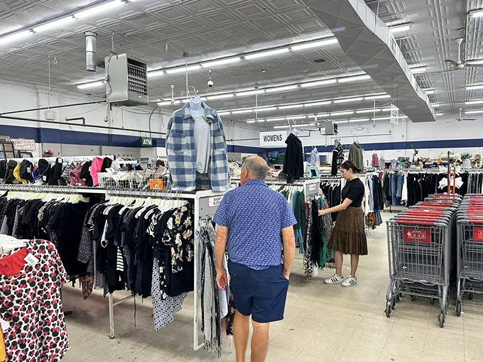 Inside, the expansive clothing section stretches as far as the eye can see, with color-coded racks making treasure hunting surprisingly civilized.