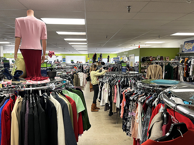 A sea of possibilities hanging on racks as far as the eye can see&mdash;each item with its own story waiting to be continued.