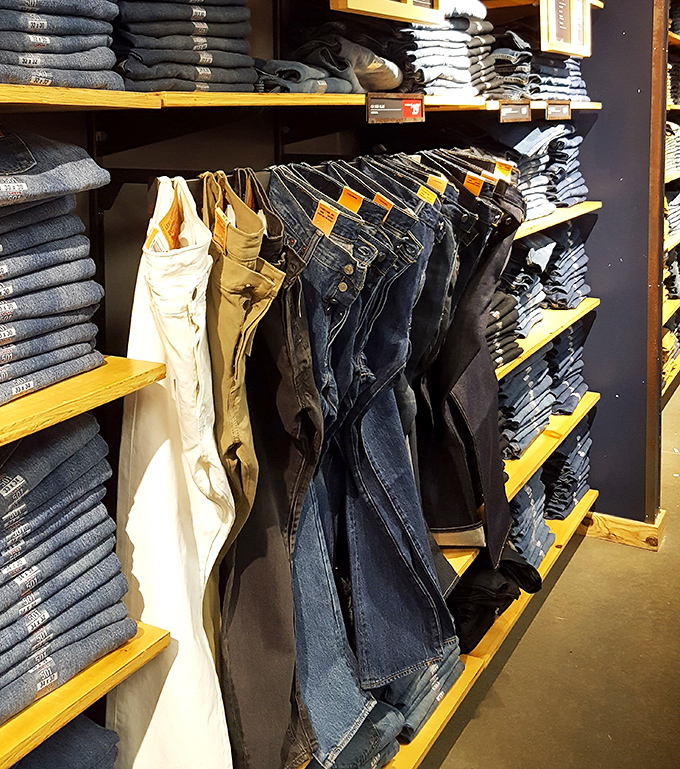 Denim stacks tell the story of American fashion democracy, where everyone deserves perfect-fitting jeans.