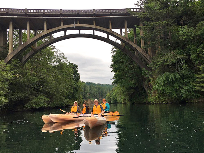 Paddling under this magnificent arch feels like gliding through a portal to simpler times. Engineering and nature in perfect harmony.