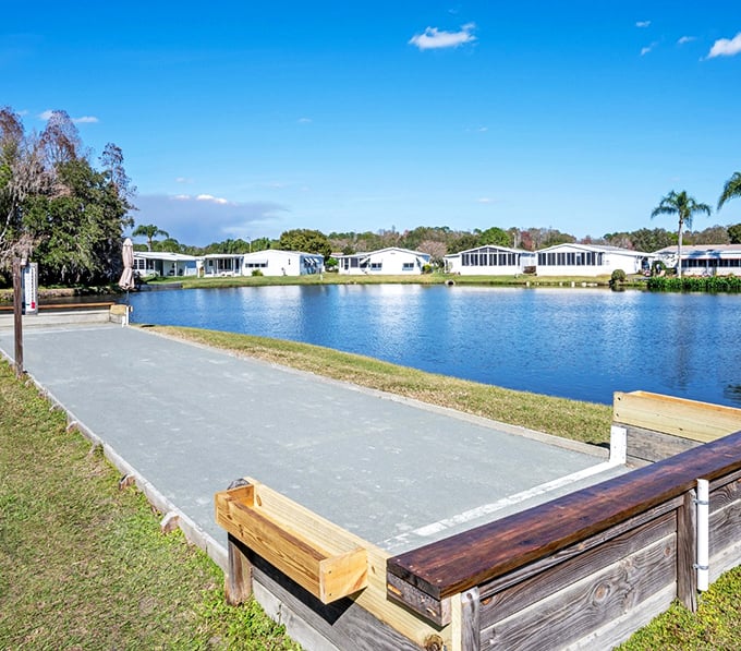 Lakefront living where your biggest decision is bocce ball or afternoon nap by the water.