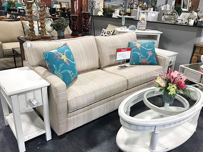 This neutral sofa with those turquoise pillows proves that sometimes the perfect pop of color changes everything about a room.