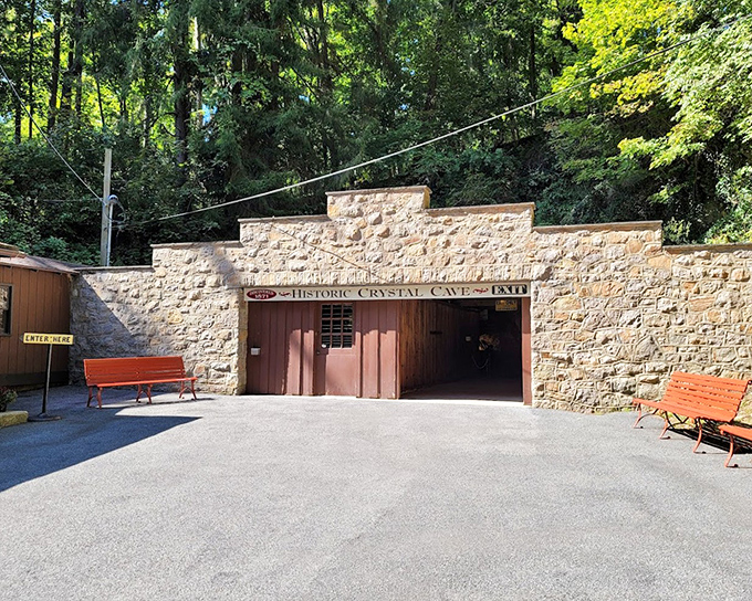Historic Crystal Cave &ndash; three simple words on this stone entrance that promise geological marvels beyond those wooden doors.