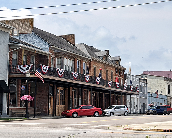 Patriotic bunting adorns these historic brick buildings like jewelry on a grande dame. Main Street Metamora doesn't need to pretend to be from another era&mdash;it actually is.