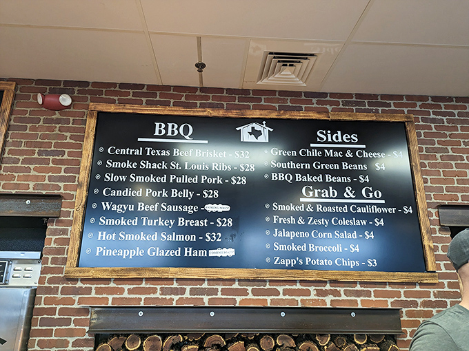 The menu board tells the brutal truth of barbecue economics: when it's gone, it's gone. Like concert tickets to your favorite band's farewell tour.