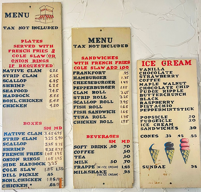 A menu board that's practically a historical document. When prices were this low, dinosaurs probably ordered the clam roll.