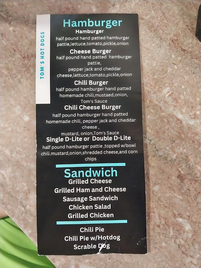 The menu board at Tom's doesn't need fancy descriptions&mdash;these are hot dogs with purpose, burgers with conviction, and sandwiches with integrity.