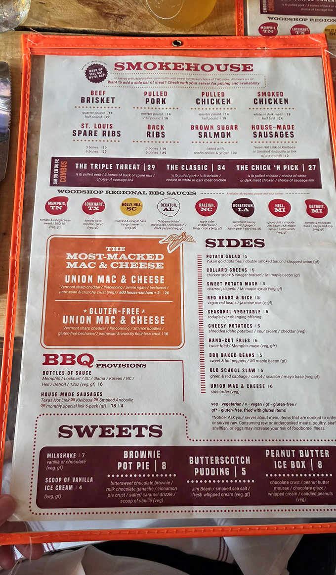 The menu reads like barbecue poetry&mdash;St. Louis ribs, pulled pork, and that legendary mac & cheese competing for your affection. Choose wisely, or just order it all.