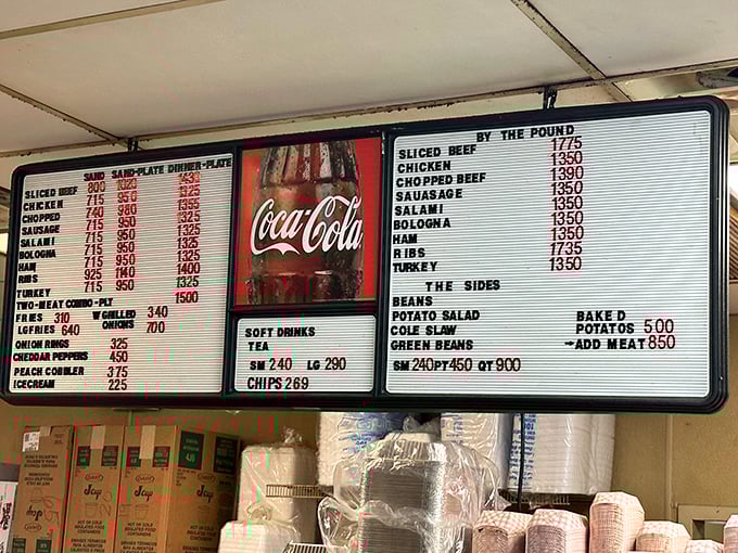 A menu board that cuts to the chase: meat, sides, and sweet tea. No fancy descriptions needed when the food speaks this loudly.
