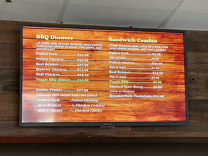 The menu board tells a simple story: meat, sides, happiness. No fancy descriptions needed when the food speaks volumes on its own.