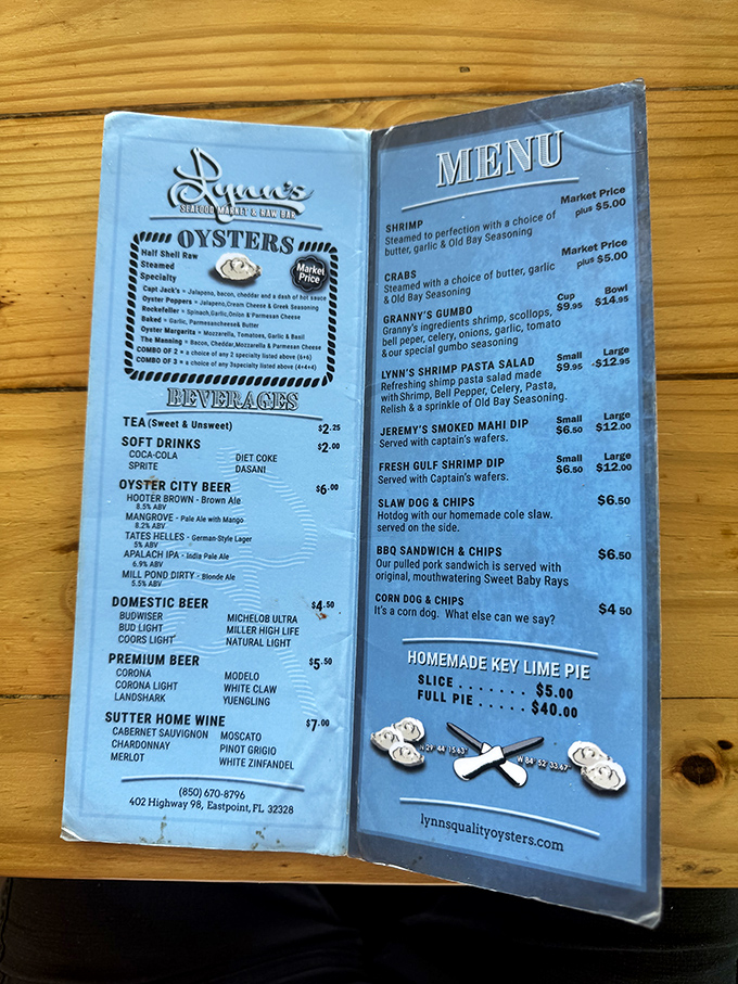 The blue menu tells no lies&mdash;this is the roadmap to seafood nirvana, with that key lime pie temptation lurking at the bottom.