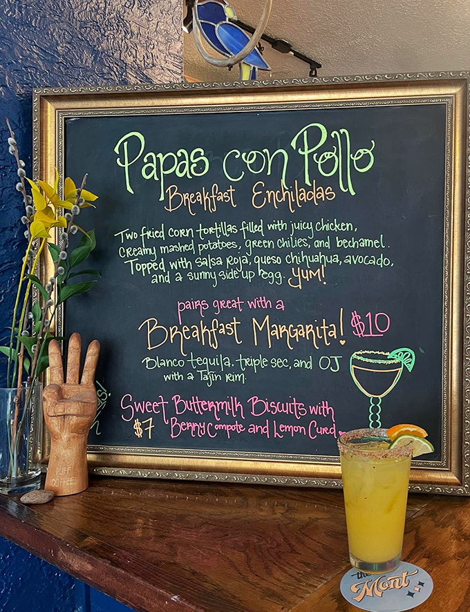 That chalkboard menu isn't just listing food&mdash;it's publishing poetry. The "Papas con Pollo" breakfast enchiladas are practically Shakespearean.
