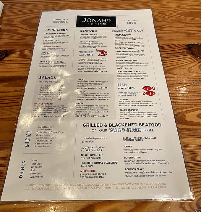 A menu that reads like a love letter to Southern seafood. Each description makes your stomach growl louder than your neighbor's lawnmower on Sunday morning.