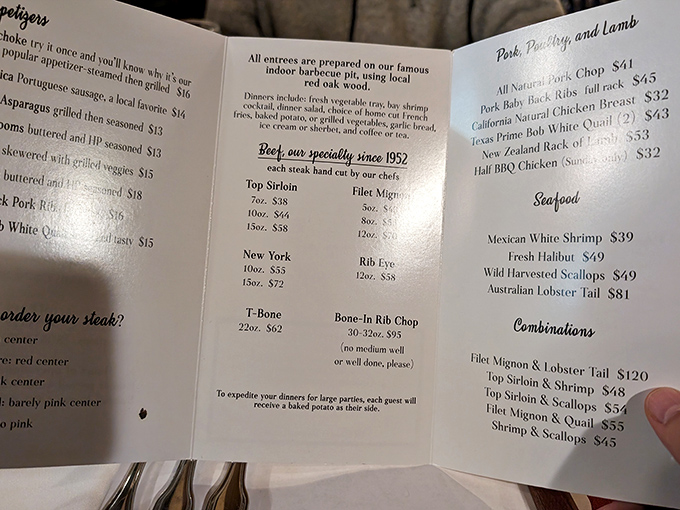 The menu reads like a love letter to meat enthusiasts, with hand-cut steaks taking center stage since 1952 and seafood options for those who swim against the current.