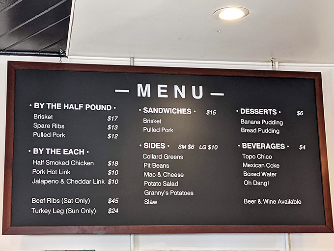 The menu board tells a simple story: meat by weight, spectacular sides, and the weekend specials that have regulars blocking off their calendars months in advance.