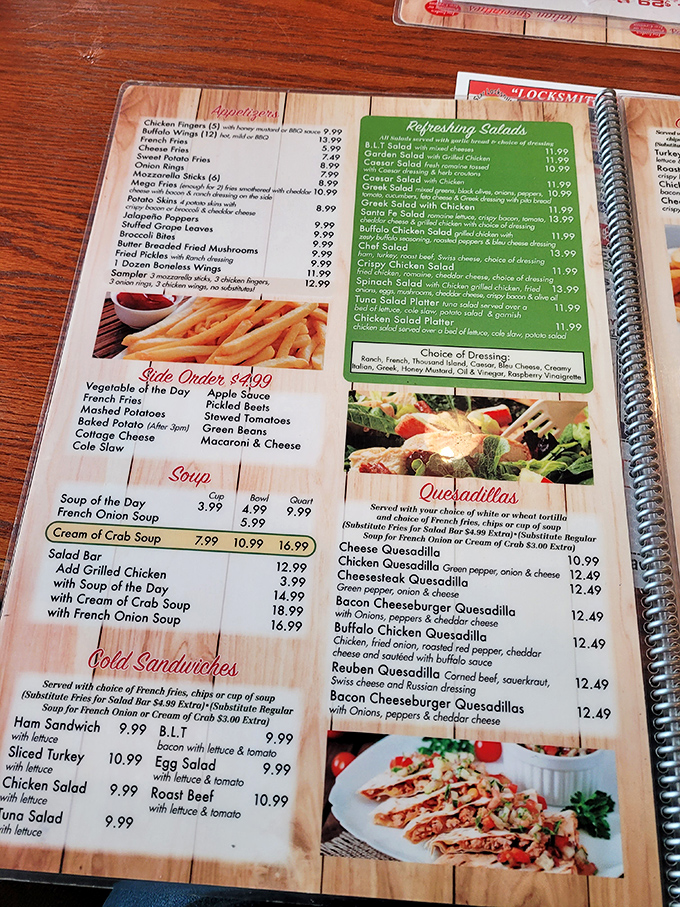 The spiral-bound menu reads like a novel of comfort food classics, with appetizers, salads, and sandwiches that promise satisfaction for every craving.