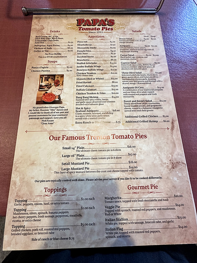 The menu tells stories between its lines. Notice that mustard pie description&mdash;a thin layer of spicy mustard that transforms pizza into something uniquely, wonderfully Jersey.