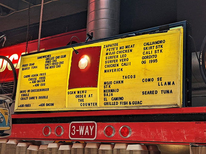 The menu board at Garaje speaks the universal language of deliciousness. Zapatos, tacos, and burgers compete for your attention in a mouthwatering showdown.