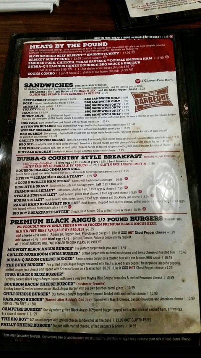 The menu reads like a love letter to smoked meat enthusiasts. Each item represents hours of patience, wood smoke, and the kind of dedication that makes barbecue an art form.