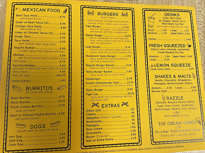 The yellow menu board tells a delicious story&mdash;burgers, burritos, and shakes living in perfect harmony like a culinary Brady Bunch.