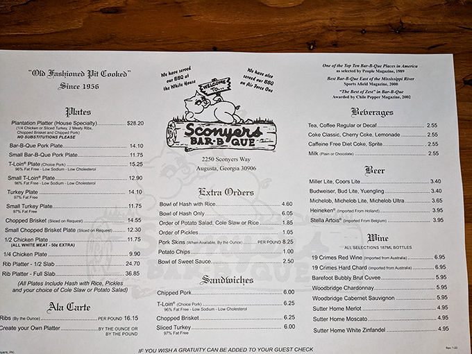 The menu reads like a love letter to smoked meat traditions, with "Old Fashioned Pit Cooked" promising authenticity in every bite.